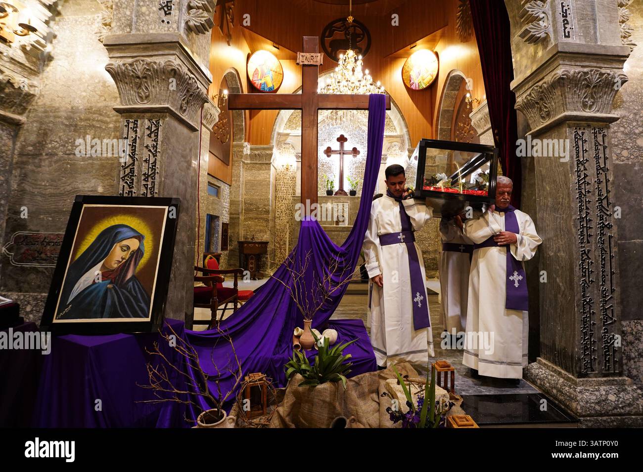 Clergy carry the coffin of Christ during the Good Friday procession at ...
