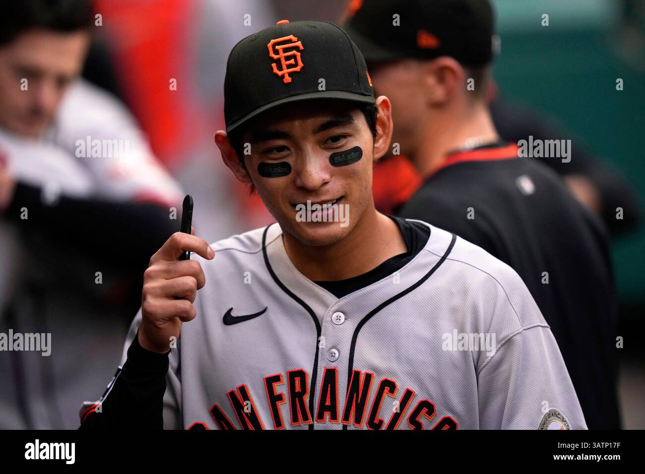 San Francisco Giants Jung Hoo Lee stands in the dugout prior to a baseball game against the Los ...