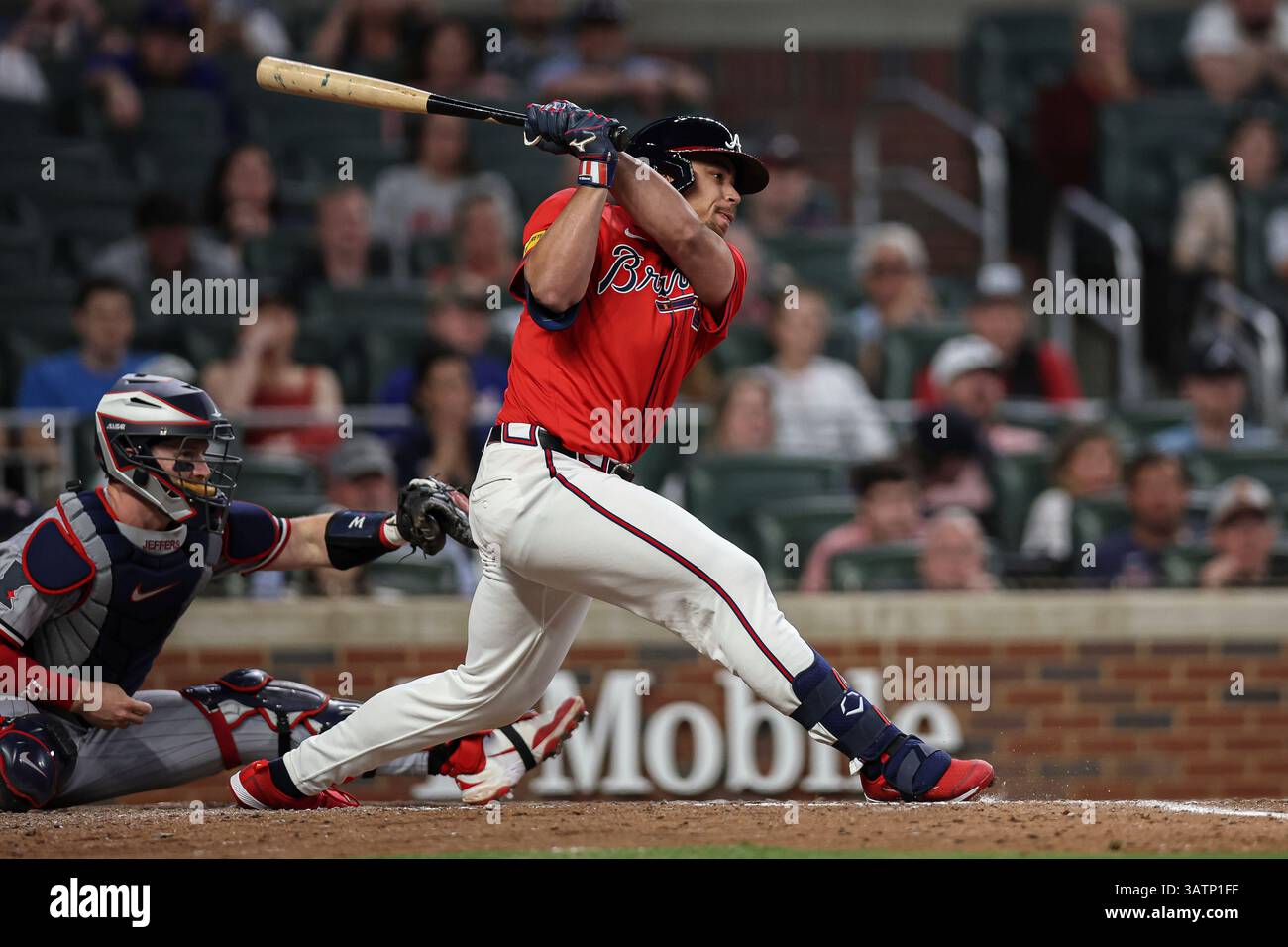 Atlanta Braves' Drake Baldwin, right, hits a game-winning pinch hit ...