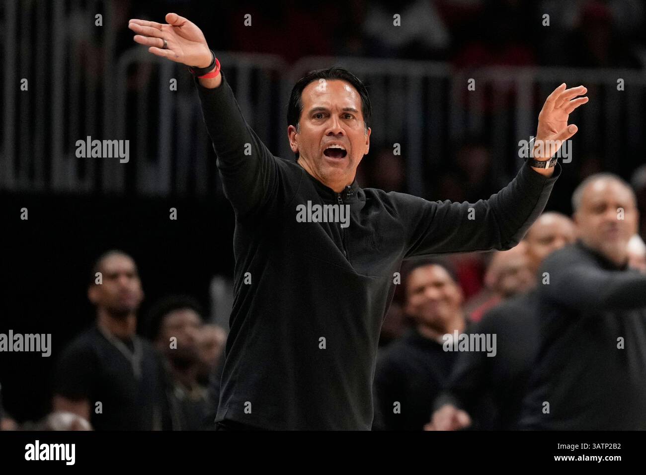 Miami Heat heat coach Erik Spoelstra talks to the players in the second ...