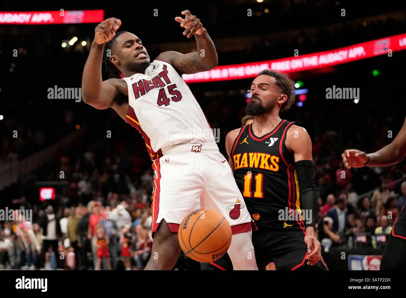 Atlanta Hawks guard Trae Young (11) and Miami Heat forward Haywood ...