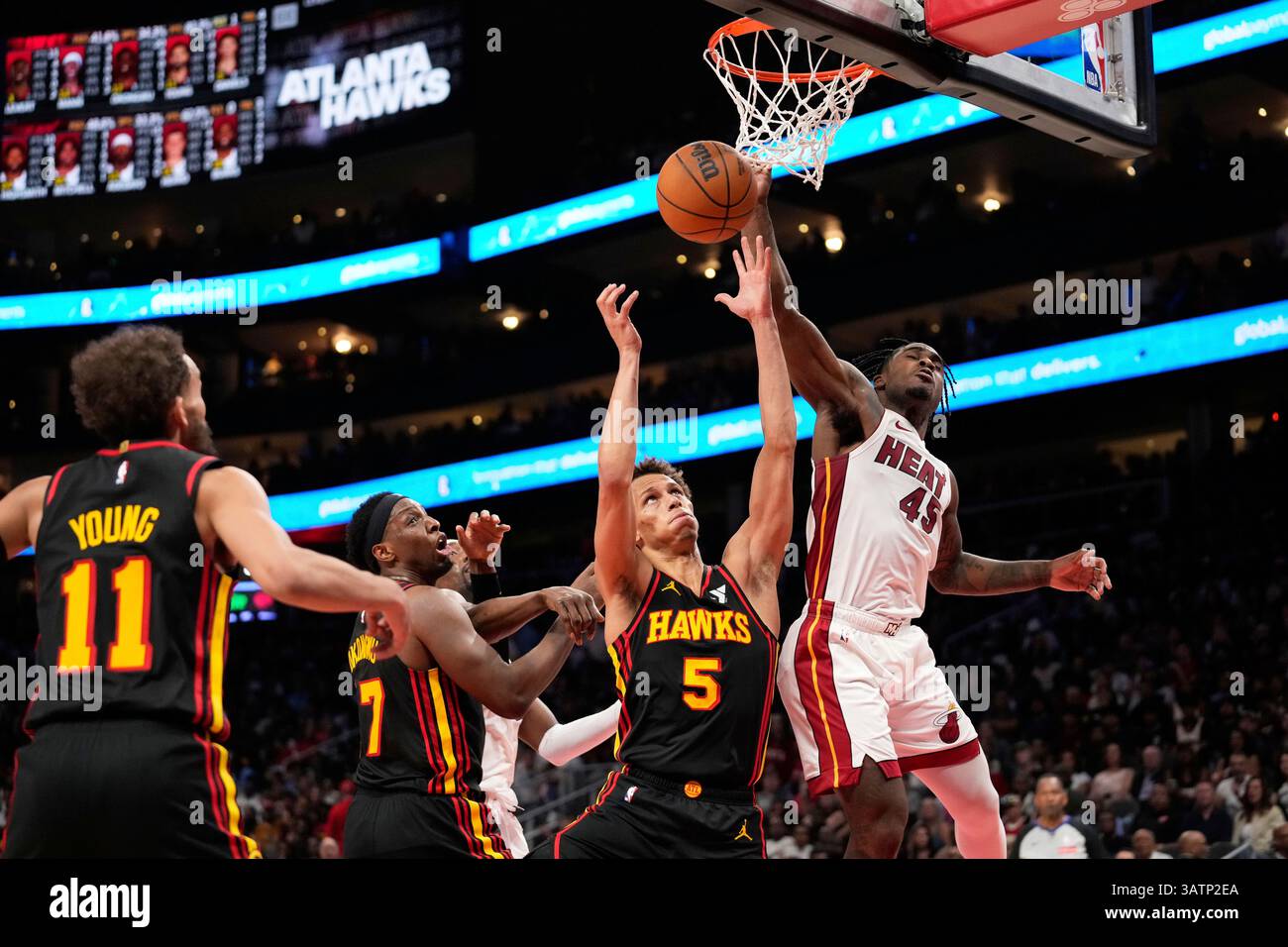 Miami Heat guard Davion Mitchell (45) and Atlanta Hawks guard Dyson ...