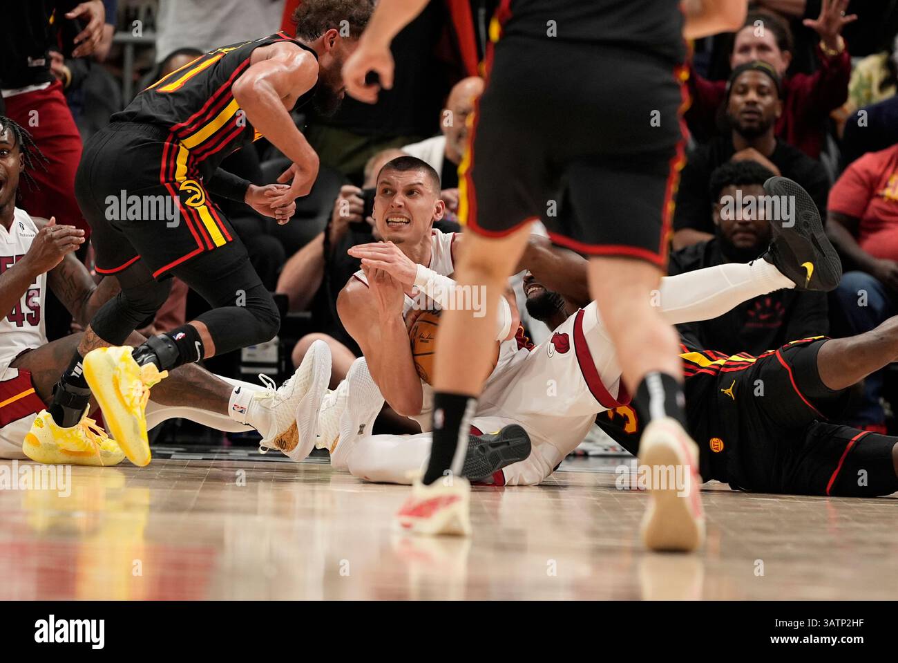 Miami Heat guard Tyler Herro (14) calls for a time out in overtime of ...