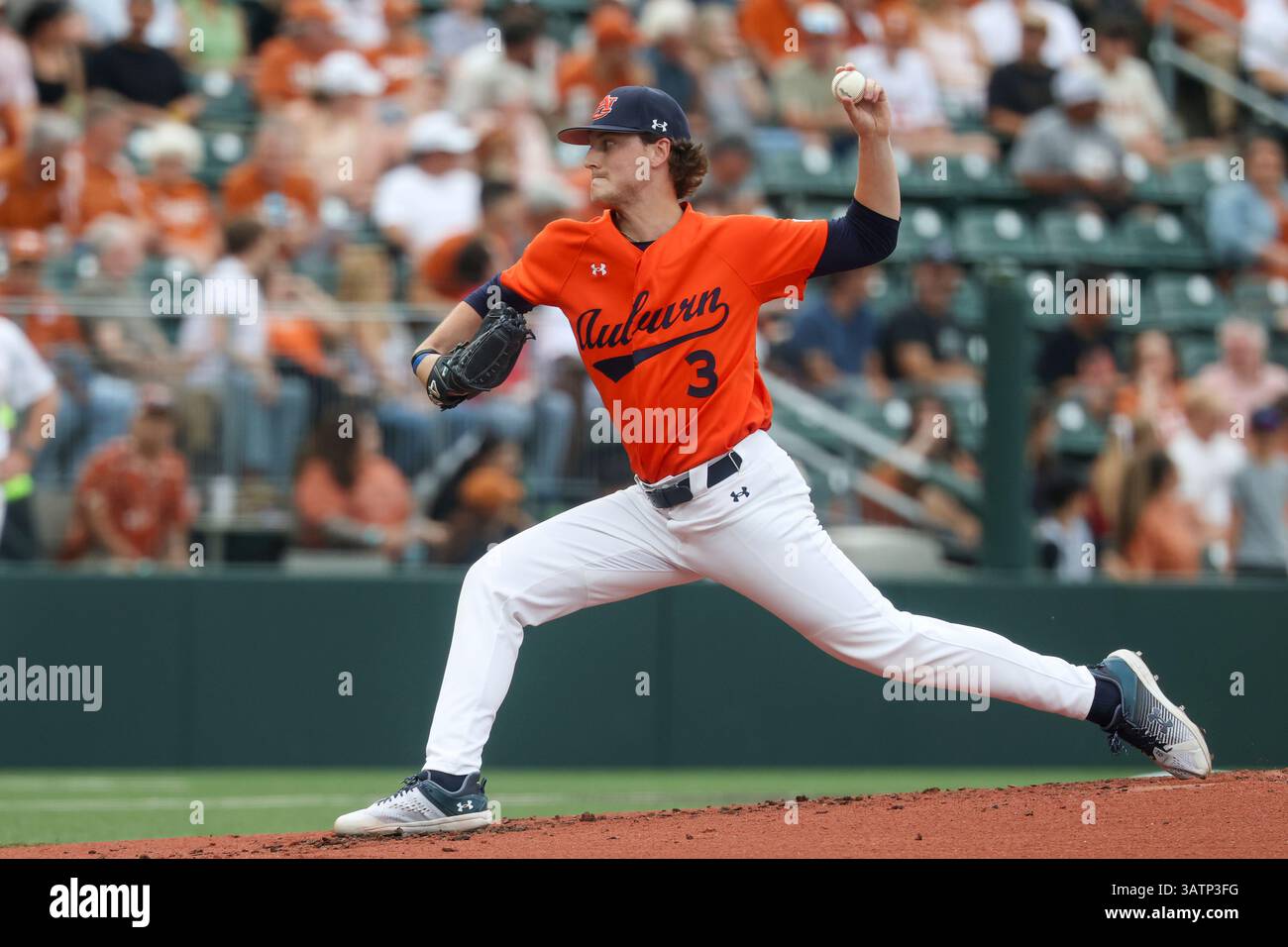 AUSTIN, TX - APRIL 18: Auburn pitcher Cade Fisher (3) pitches the ball ...