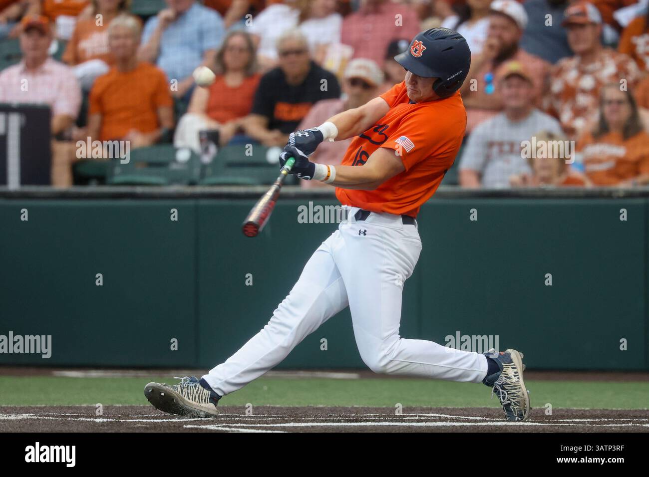 AUSTIN, TX - APRIL 18: Auburn catcher Ike Irish (18) hits a homer ...