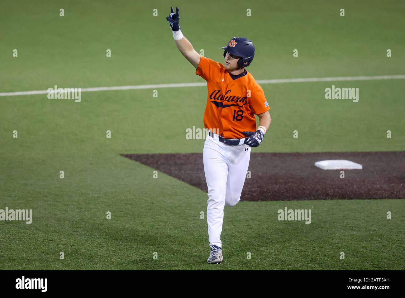 AUSTIN, TX - APRIL 18: Auburn catcher Ike Irish (18) signals to his ...