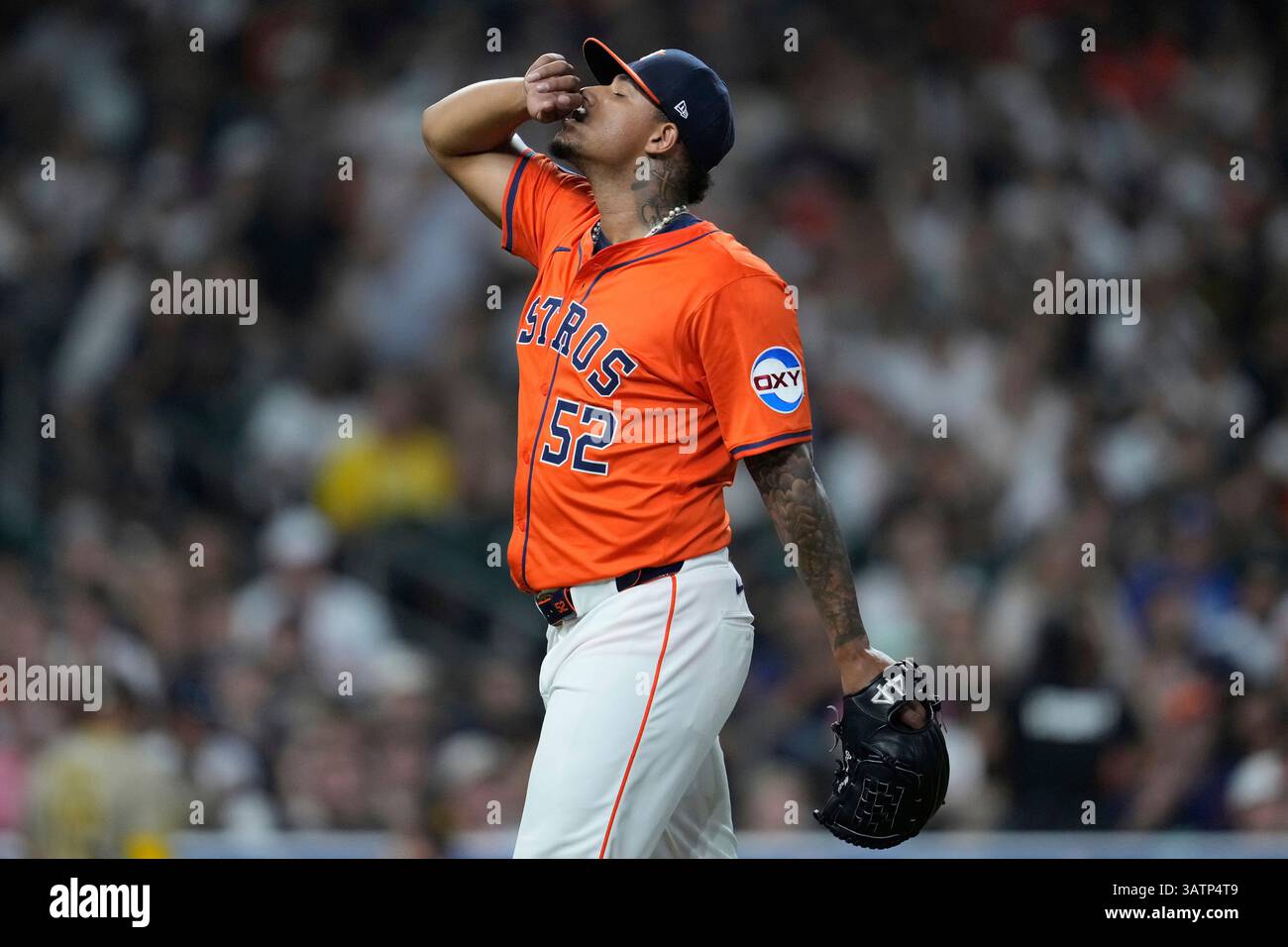 Houston Astros relief pitcher Bryan Abreu returns to the dugout after ...