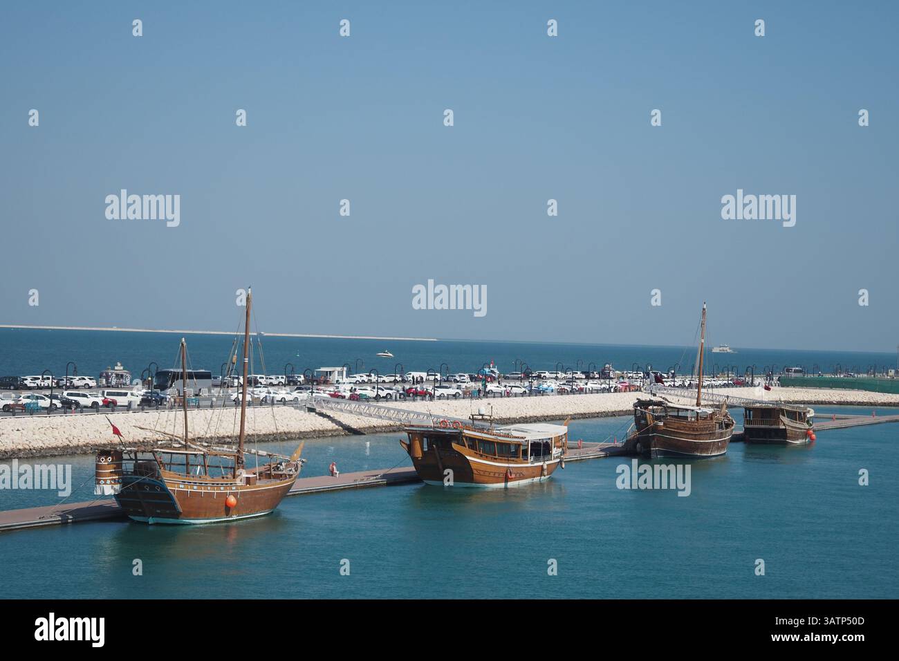 Qatar Doha 2 february 2025. Traditional wooden boats docked by the ...