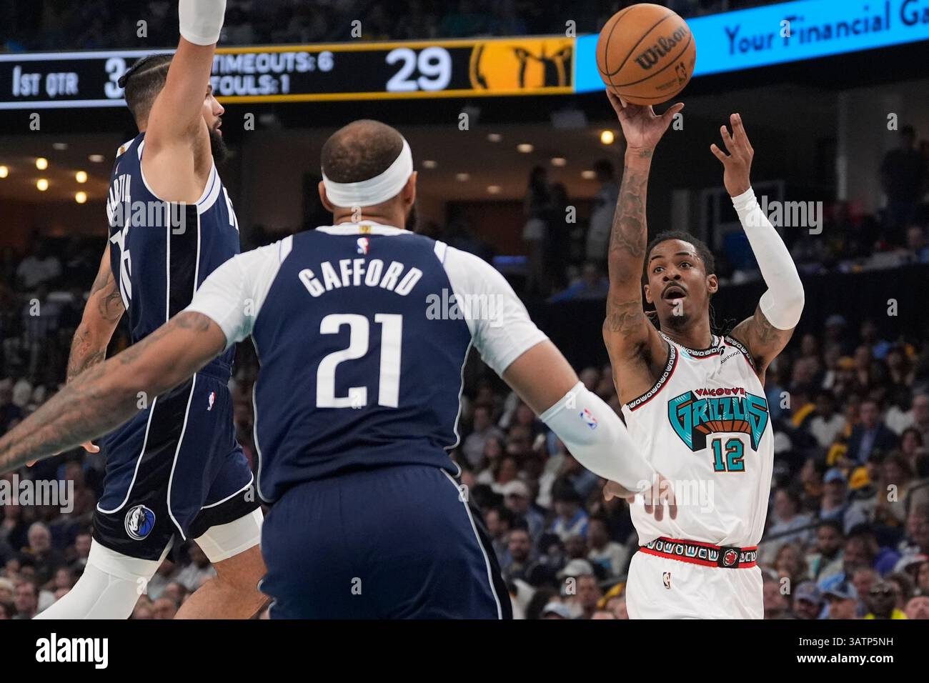 Memphis Grizzlies guard Ja Morant (12) shoots the ball past Dallas ...