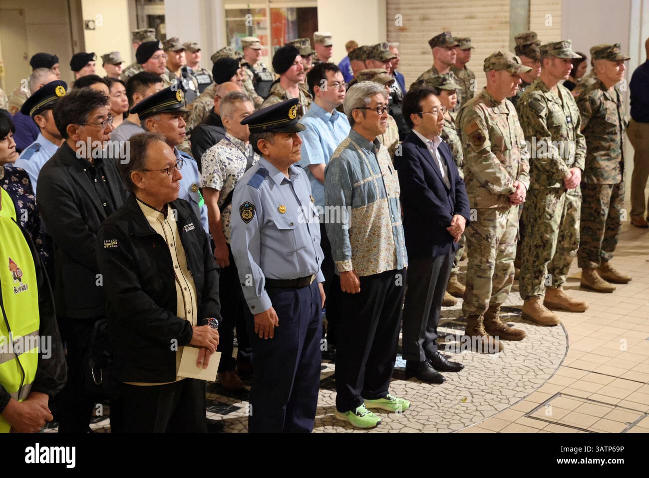 U.S. military and Japanese government officials patrolling together on ...