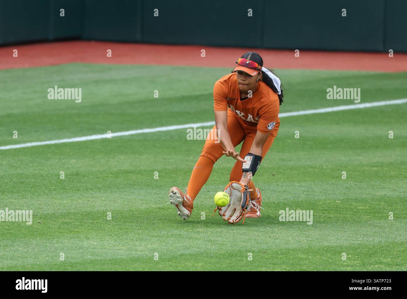 AUSTIN, TX - APRIL 18: Texas outfielder Kayden Henry (21) fields a ...
