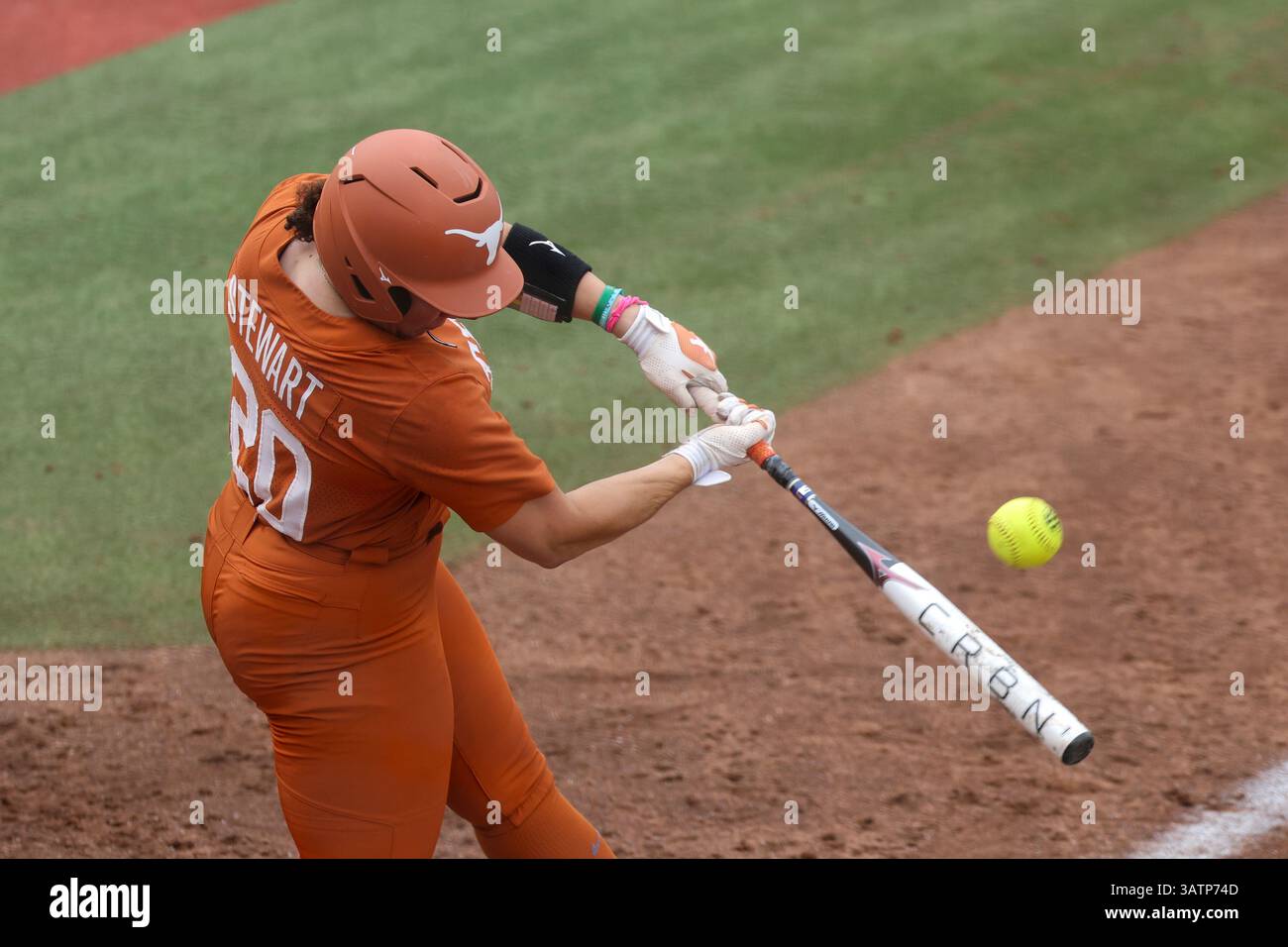 AUSTIN, TX - APRIL 18: Texas utility Katie Stewart (20) hits an RBI ...