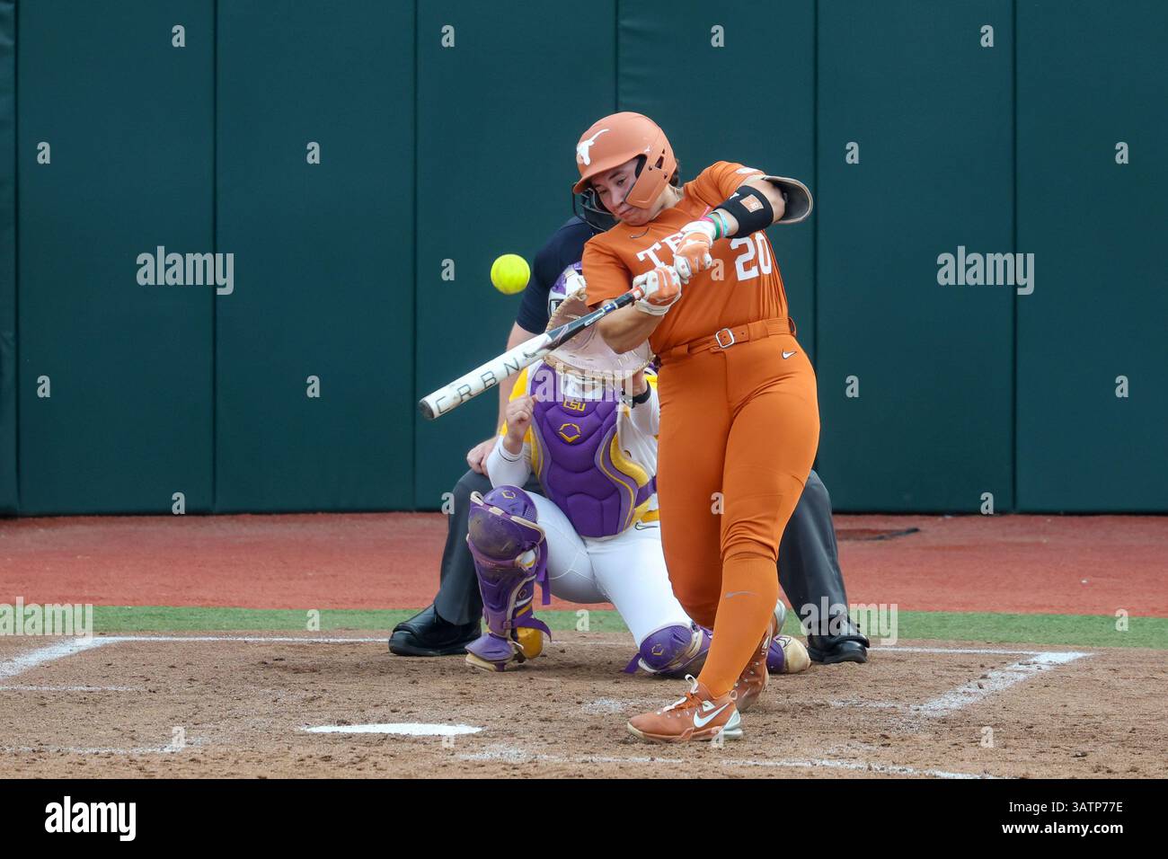 AUSTIN, TX - APRIL 18: Texas utility Katie Stewart (20) hits a deep fly ...