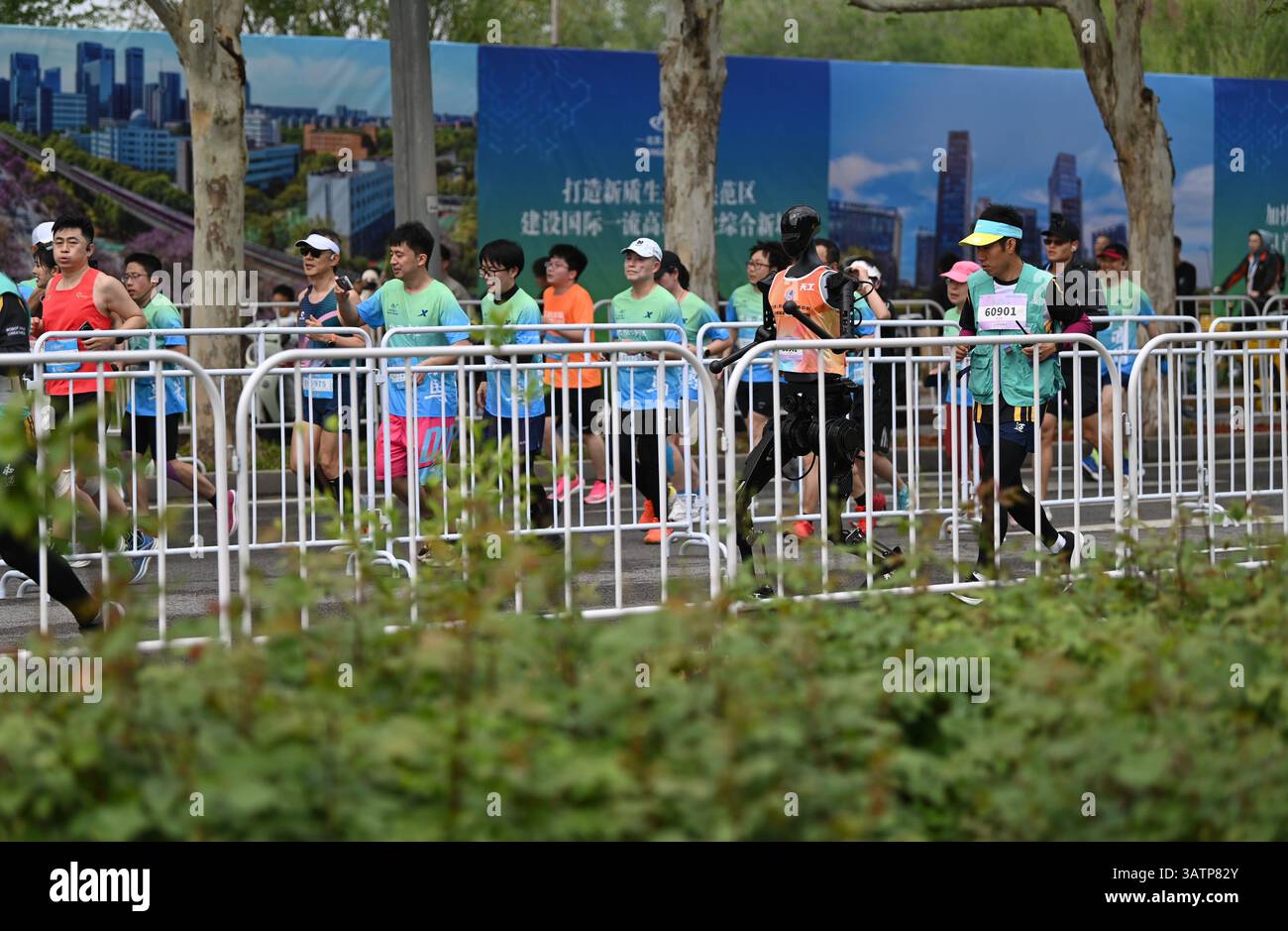 Peking, China. 19th Apr, 2025. The humanoid robot "Tian Gong" runs a ...