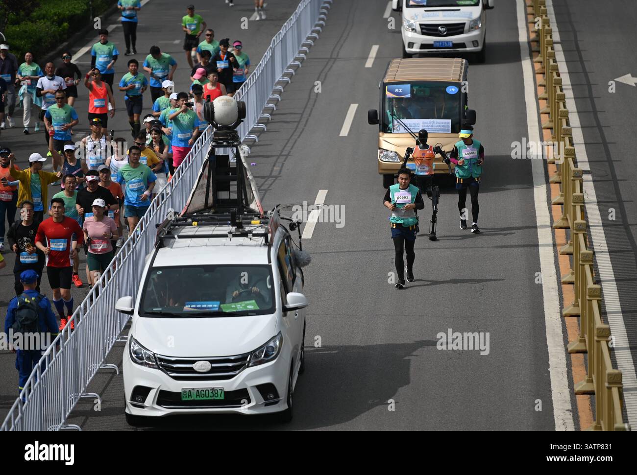 Peking, China. 19th Apr, 2025. The humanoid robot "Tian Gong" runs a ...