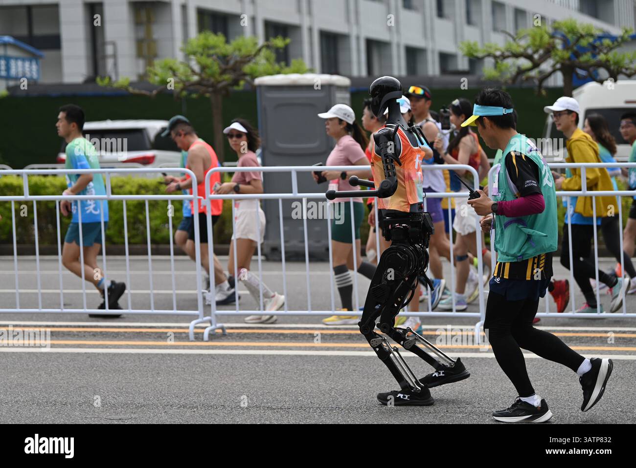 Peking, China. 19th Apr, 2025. The humanoid robot "Tian Gong" runs a ...