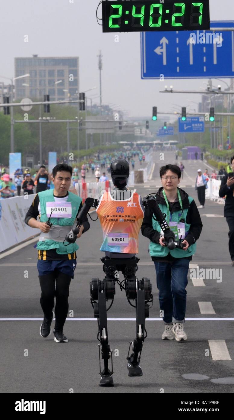 Beijing, China. 19th Apr, 2025. Robotic participant "Tiangong Ultra" (C ...