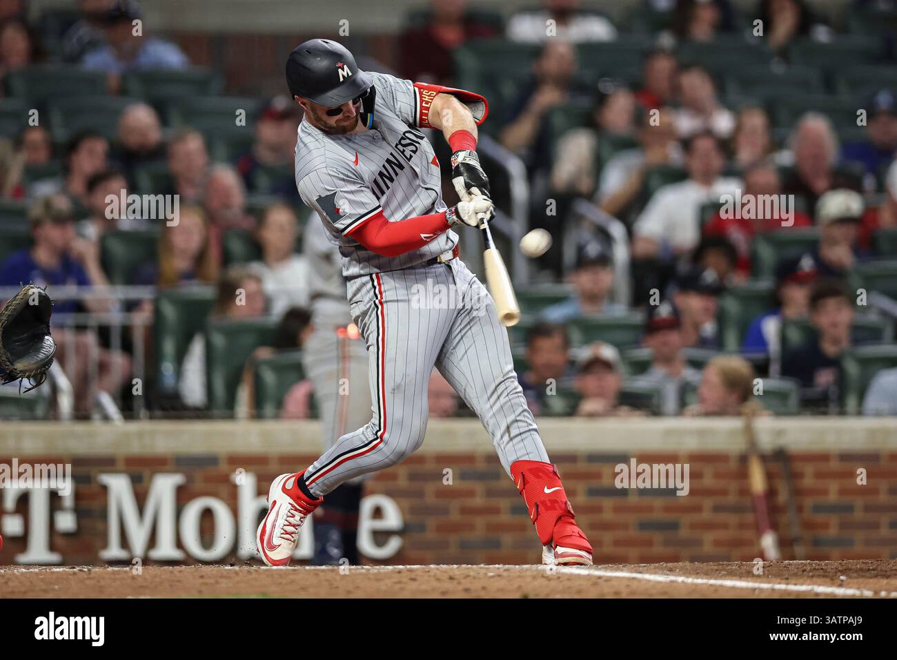 Minnesota Twins catcher Ryan Jeffers (27) hits the ball in the eighth ...