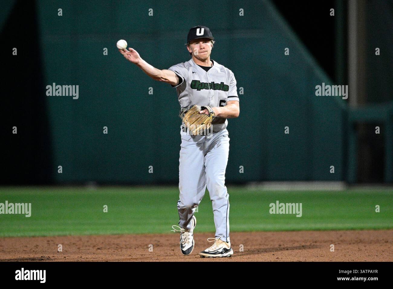 USC Upstate infielder Alex Ritzer (5) throws during an NCAA college ...