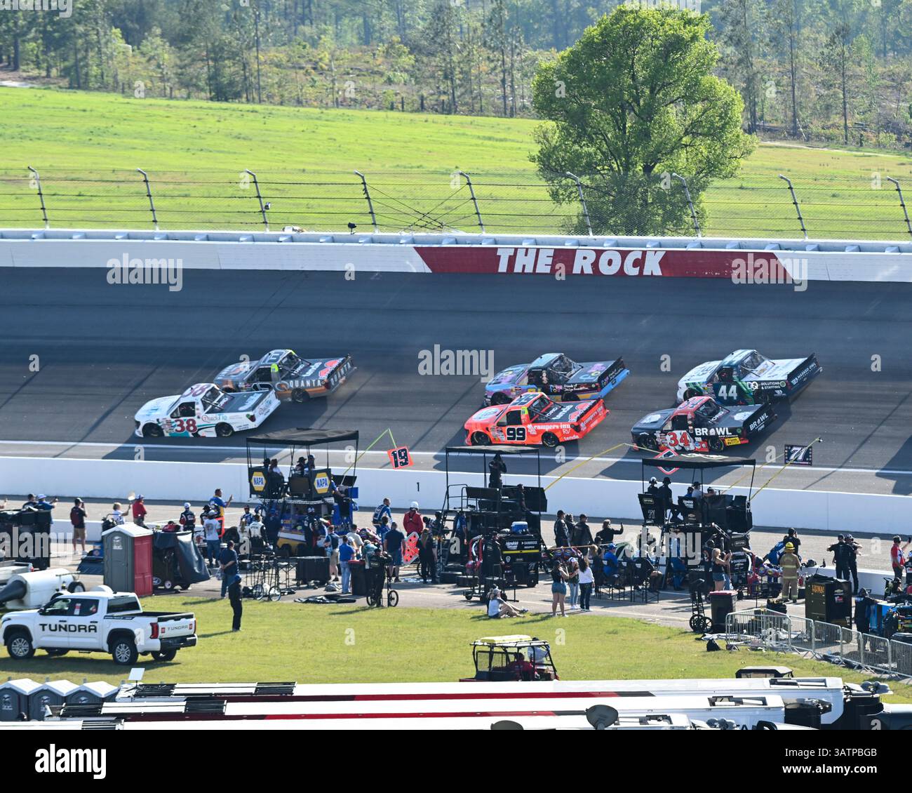 Rockingham, North Carolina, USA. 18th Apr, 2025. Cars run through turn ...