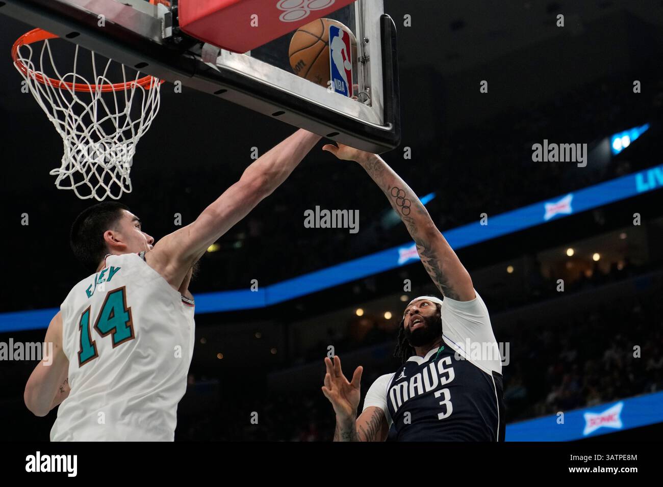 Memphis Grizzlies center Zach Edey (14) blocks a shot by Dallas ...