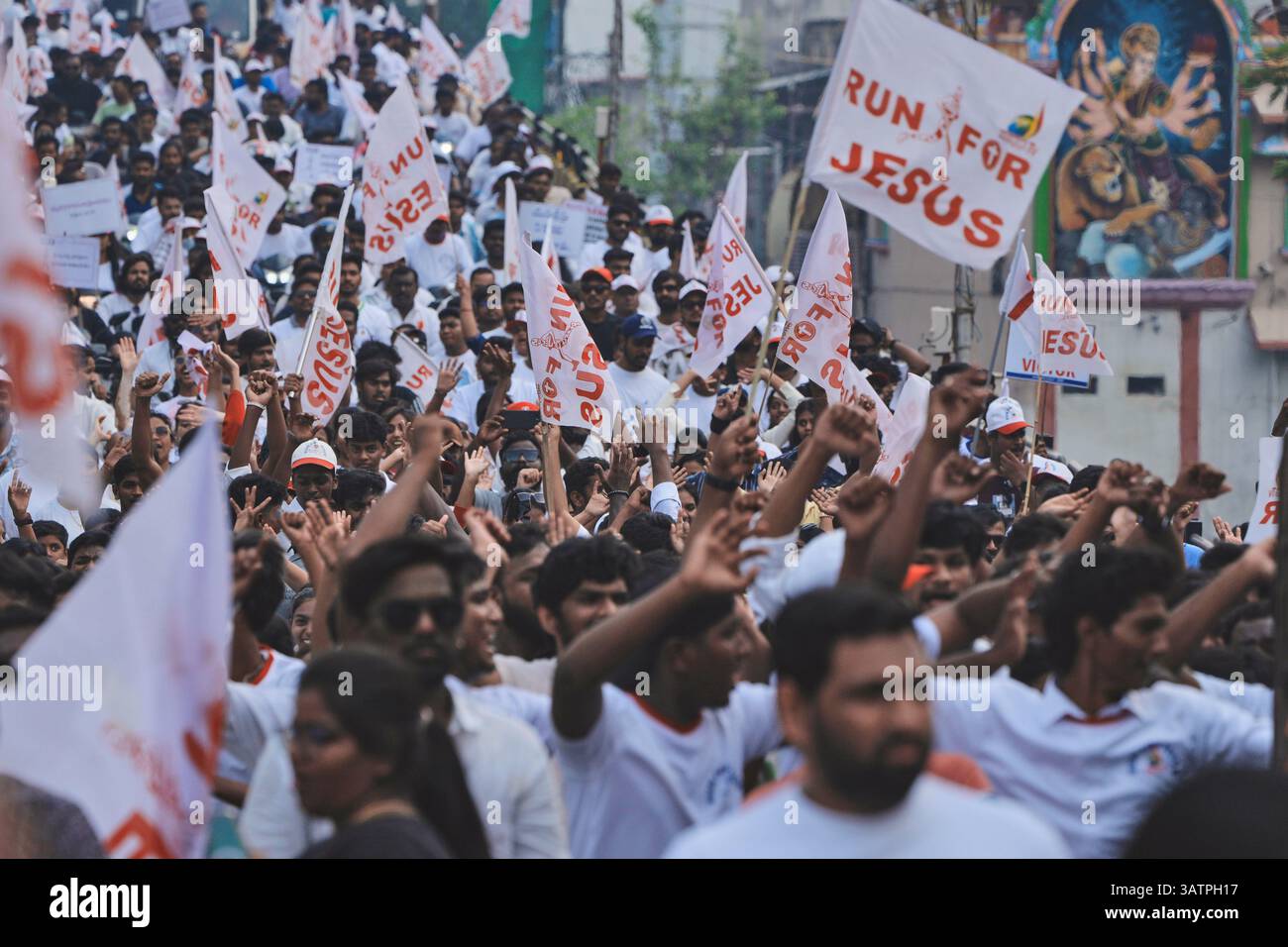 Christians participate in a "Run for Jesus" rally on the eve of Easter Sunday in Hyderabad ...