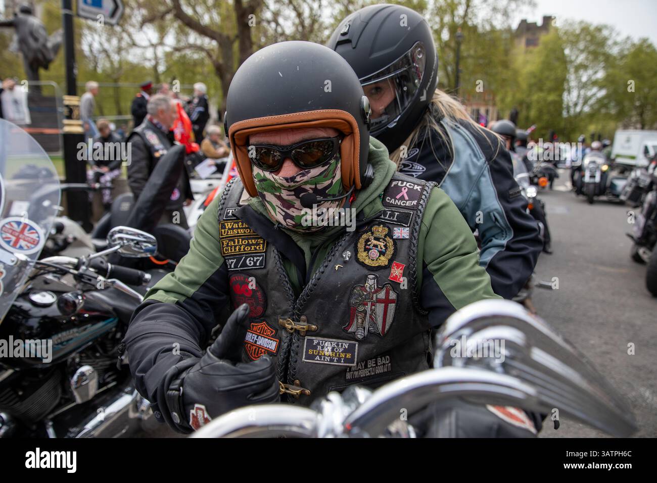 Former members of the British armed forces take part in the Good Friday ...