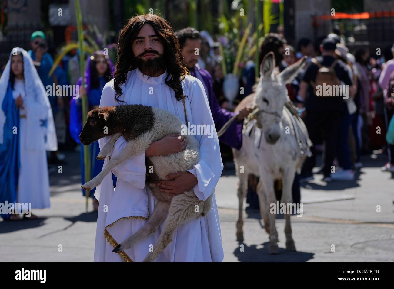 Claudio Armando Ramirez plays the role of Jesus Christ during a Palm ...
