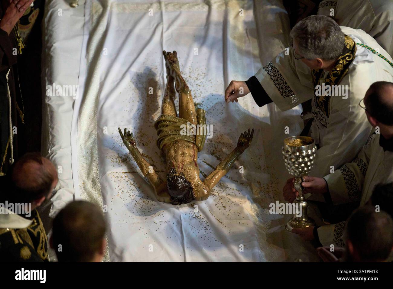 Catholic clergymen take part in a Holy Week ceremony reenacting the ...