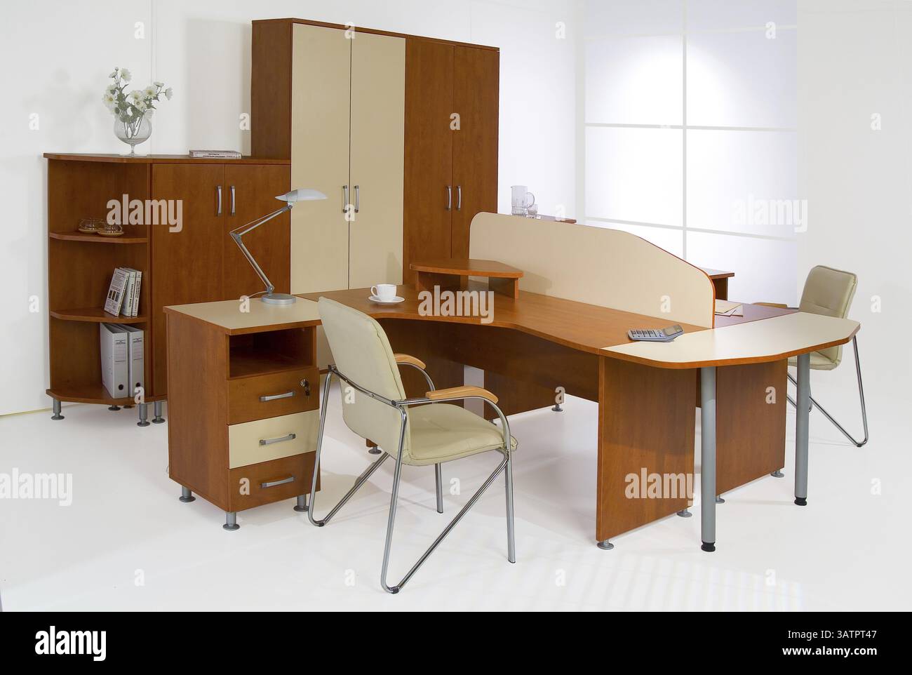 Suite of office furniture on isolated studio background Stock Photo - Alamy