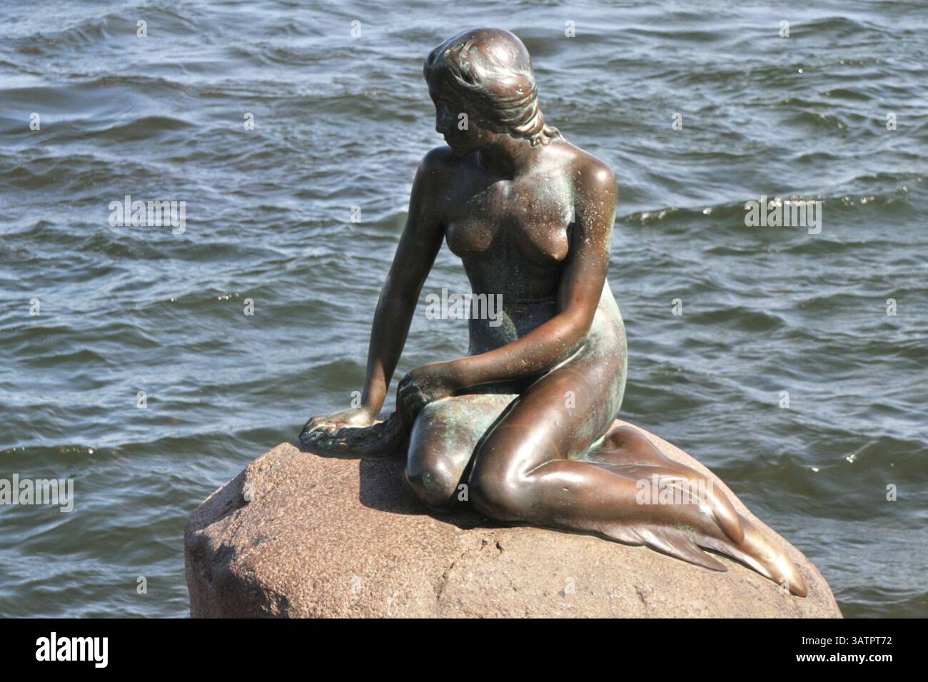 The sculpture is by the Copenhagen sculptor Edvard Eriksen (1876-1959) and the Little Mermaid ...