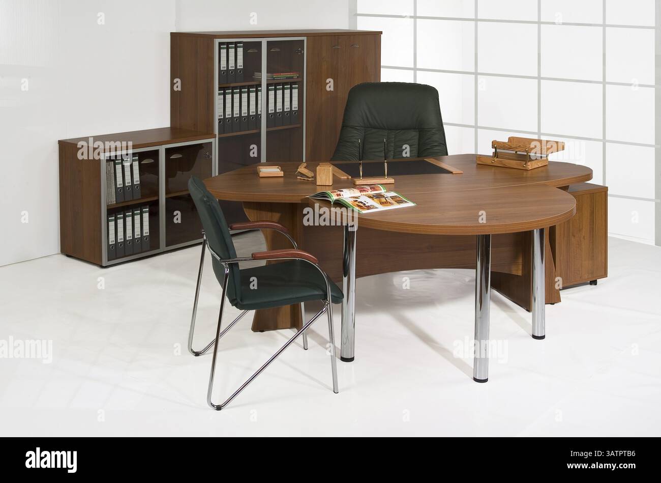 Suite of office furniture on isolated studio background Stock Photo - Alamy