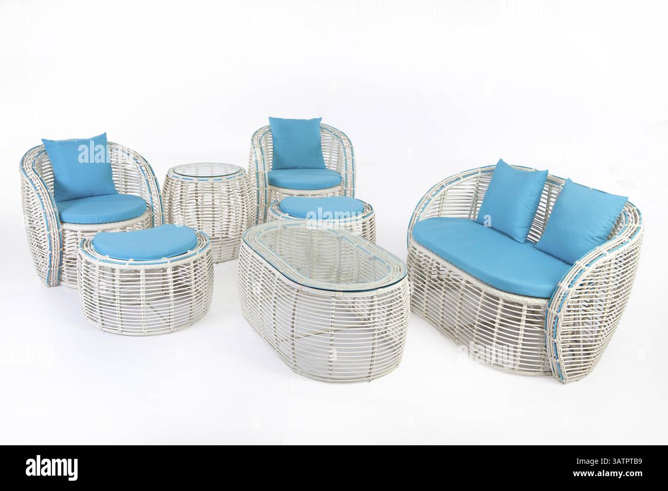 Suite of wicker furniture made of synthetic fibre on isolated ...