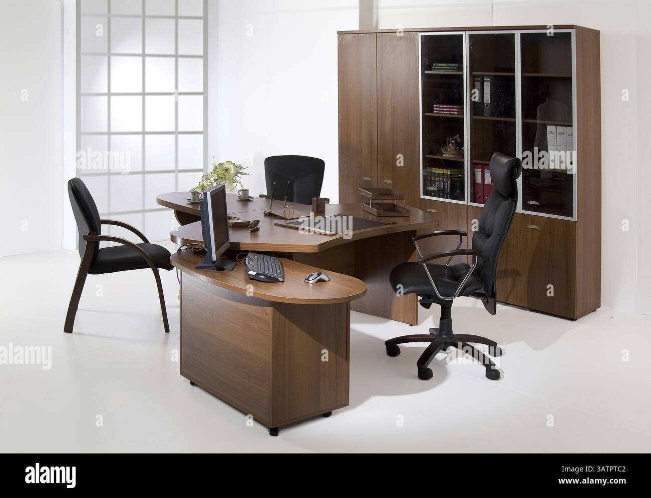 Suite of office furniture on isolated studio background Stock Photo - Alamy