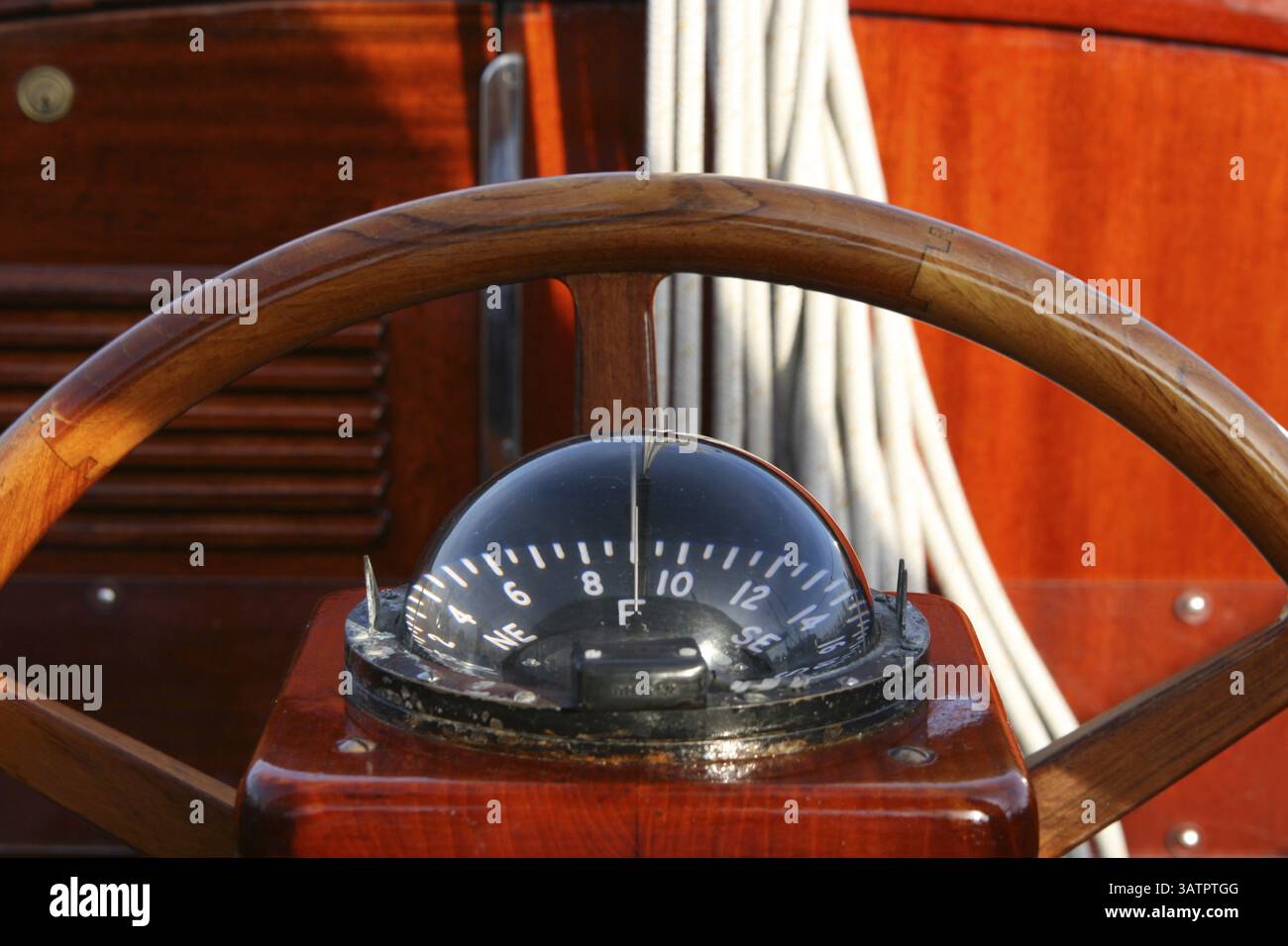 Steering wheel on a sailing ship -Old seasoned boat steering wheel ...