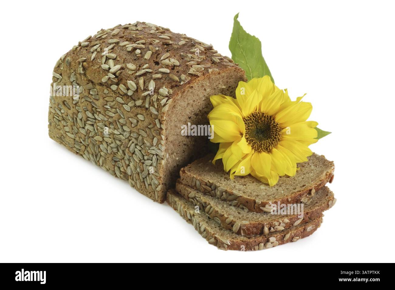 Sliced grain bread with sunflower blossom on a white background Stock ...