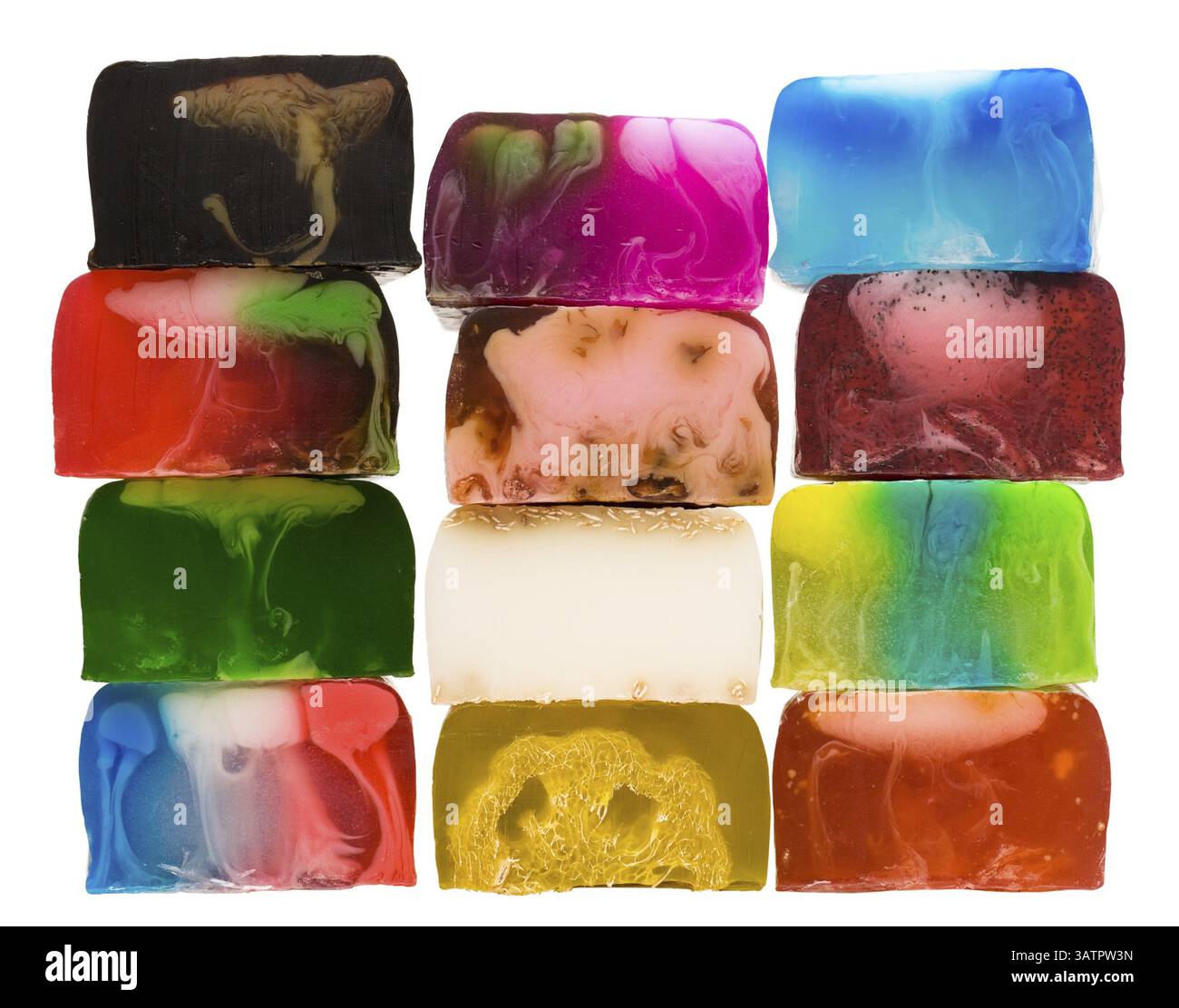 Set of several handicraft coloured nice cream soap bars in stack ...