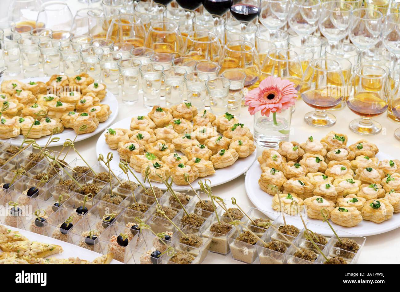A lot of cold snacks on buffet table, catering Stock Photo - Alamy