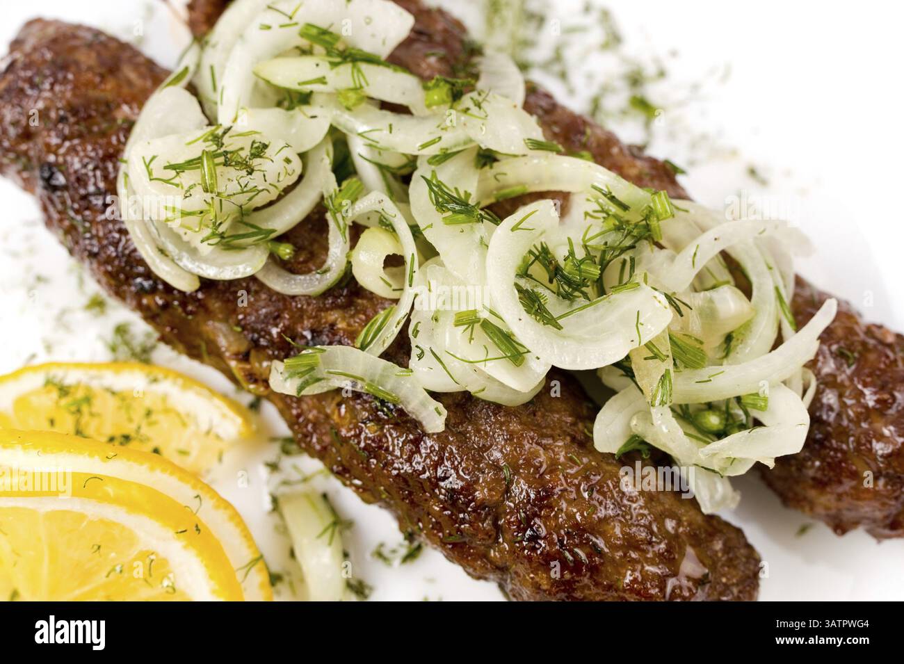 Minced mutton chops fried on skewers, macro Stock Photo - Alamy