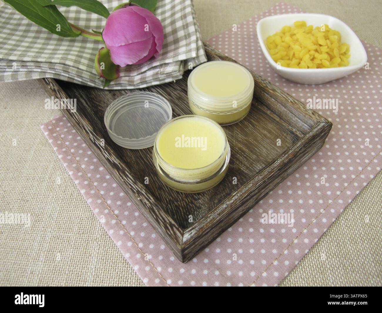 Homemade lip balm with beeswax Stock Photo - Alamy