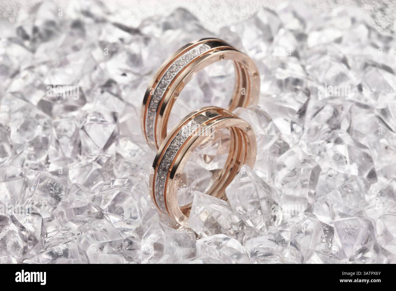 Golden rings in ice hi-res stock photography and images - Alamy