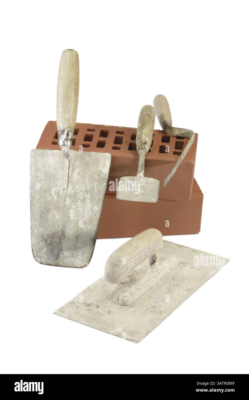 Various types of trowels and red bricks - isolated on white background ...