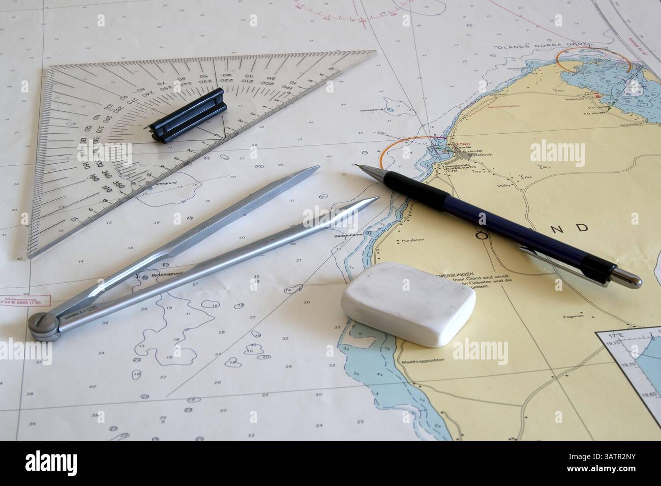 Navigation equipment and nautical chart Stock Photo - Alamy