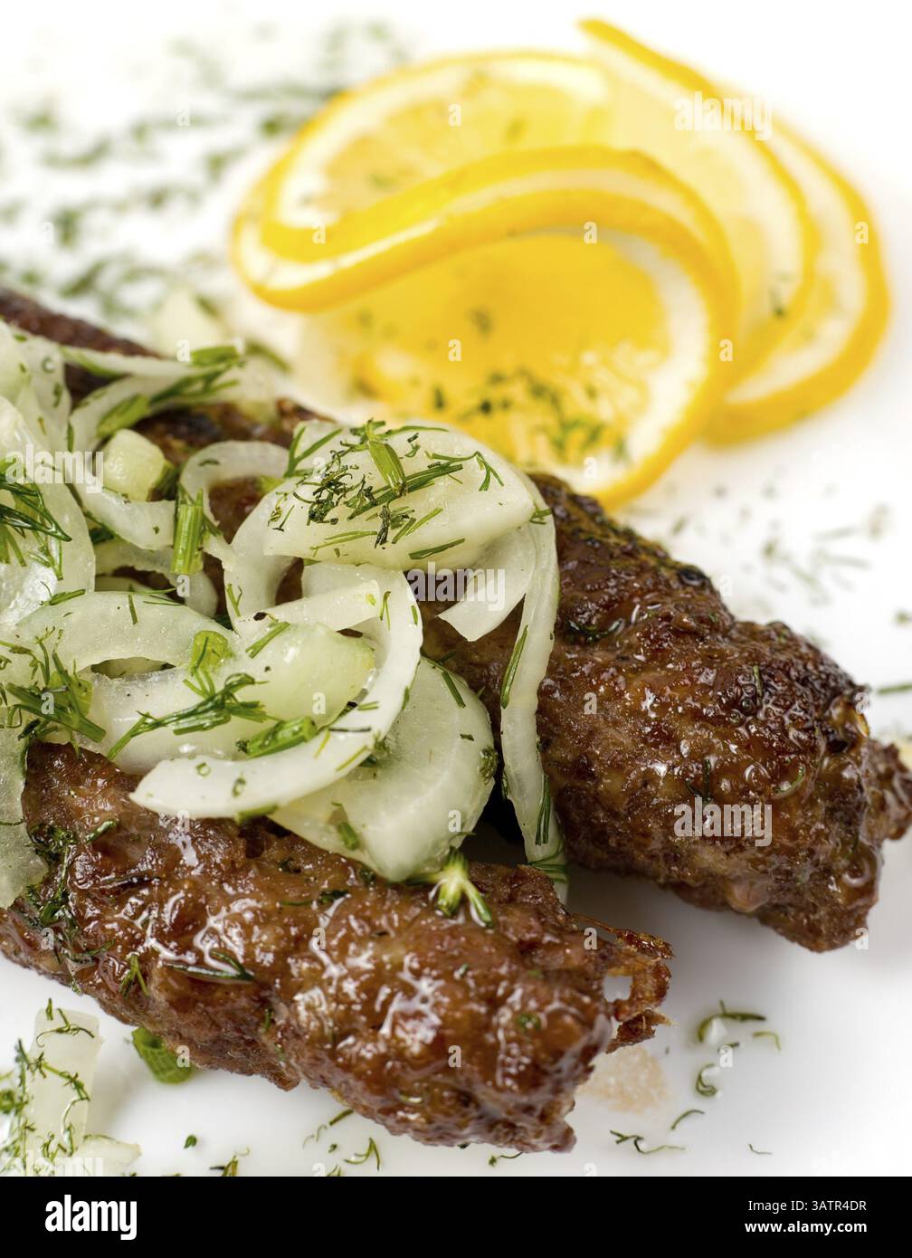 Minced mutton chops fried on skewers, macro Stock Photo - Alamy