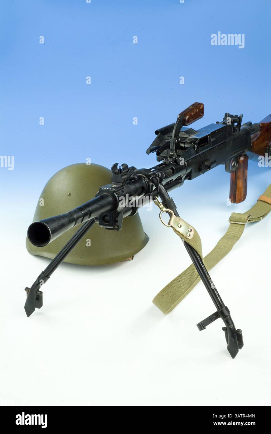 Old Russian machine gun and metal army helmet Stock Photo - Alamy
