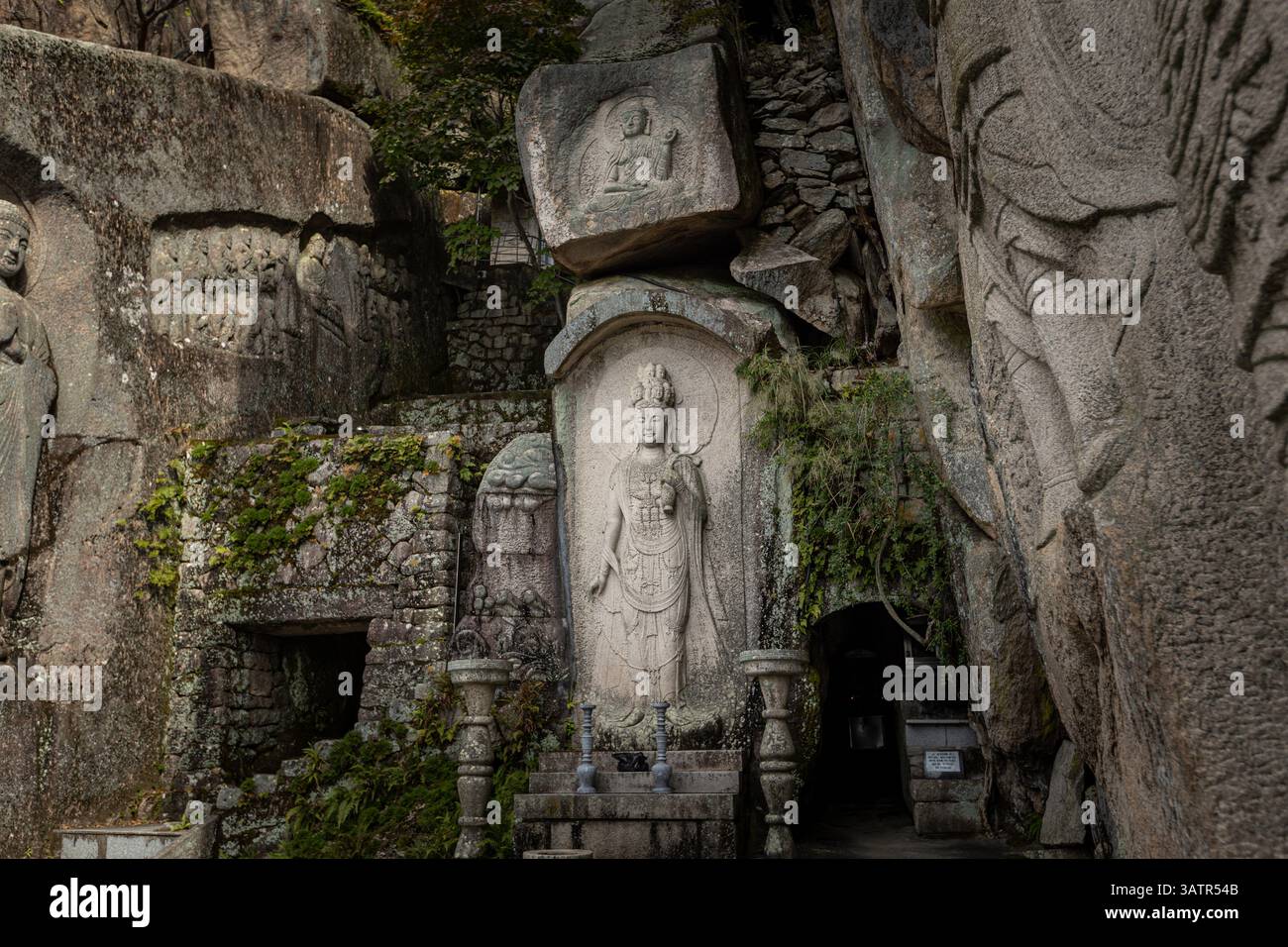 Impressive stone carvings in the natural cave at Seokbulsa Temple ...