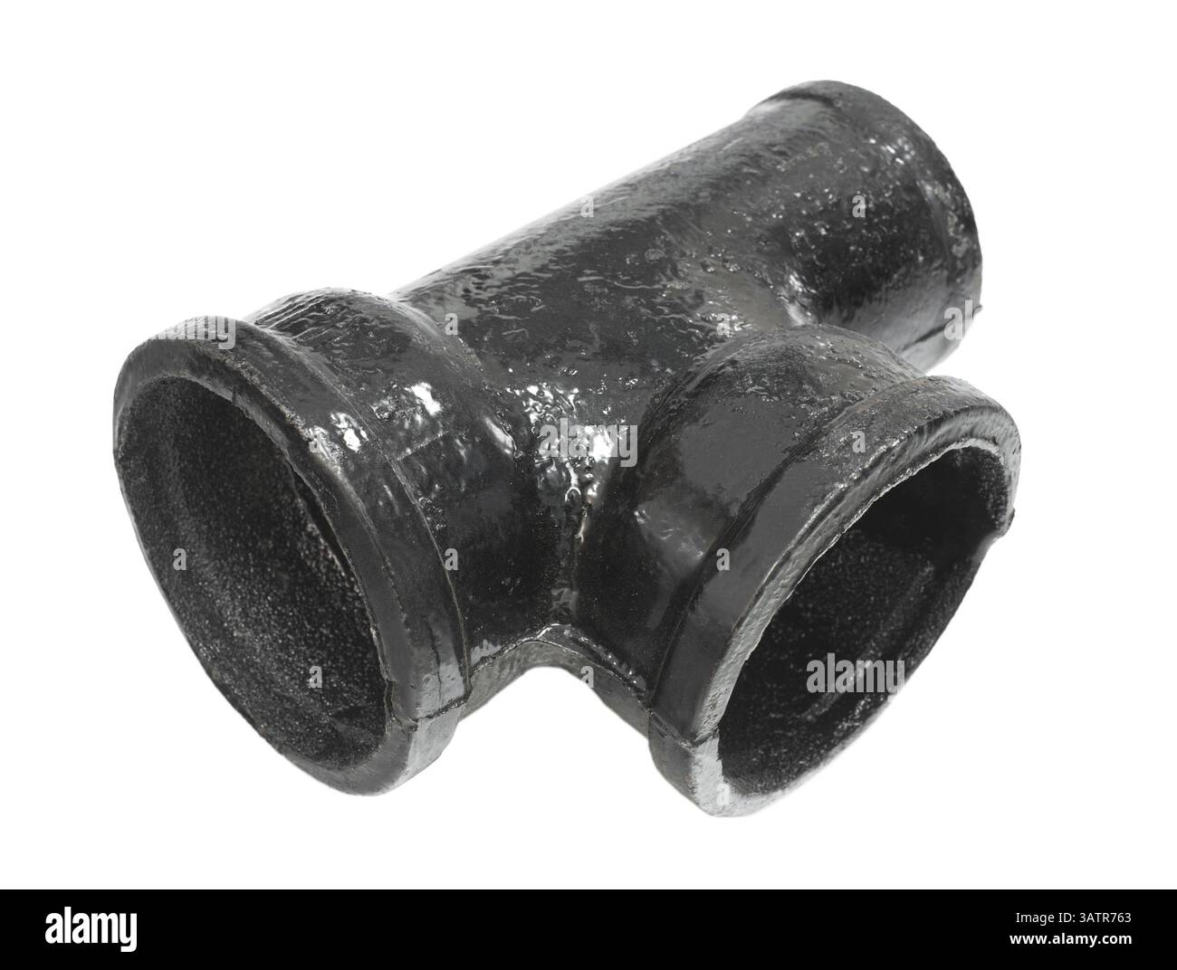 A cast iron fitting - a draining tee fitting Stock Photo - Alamy