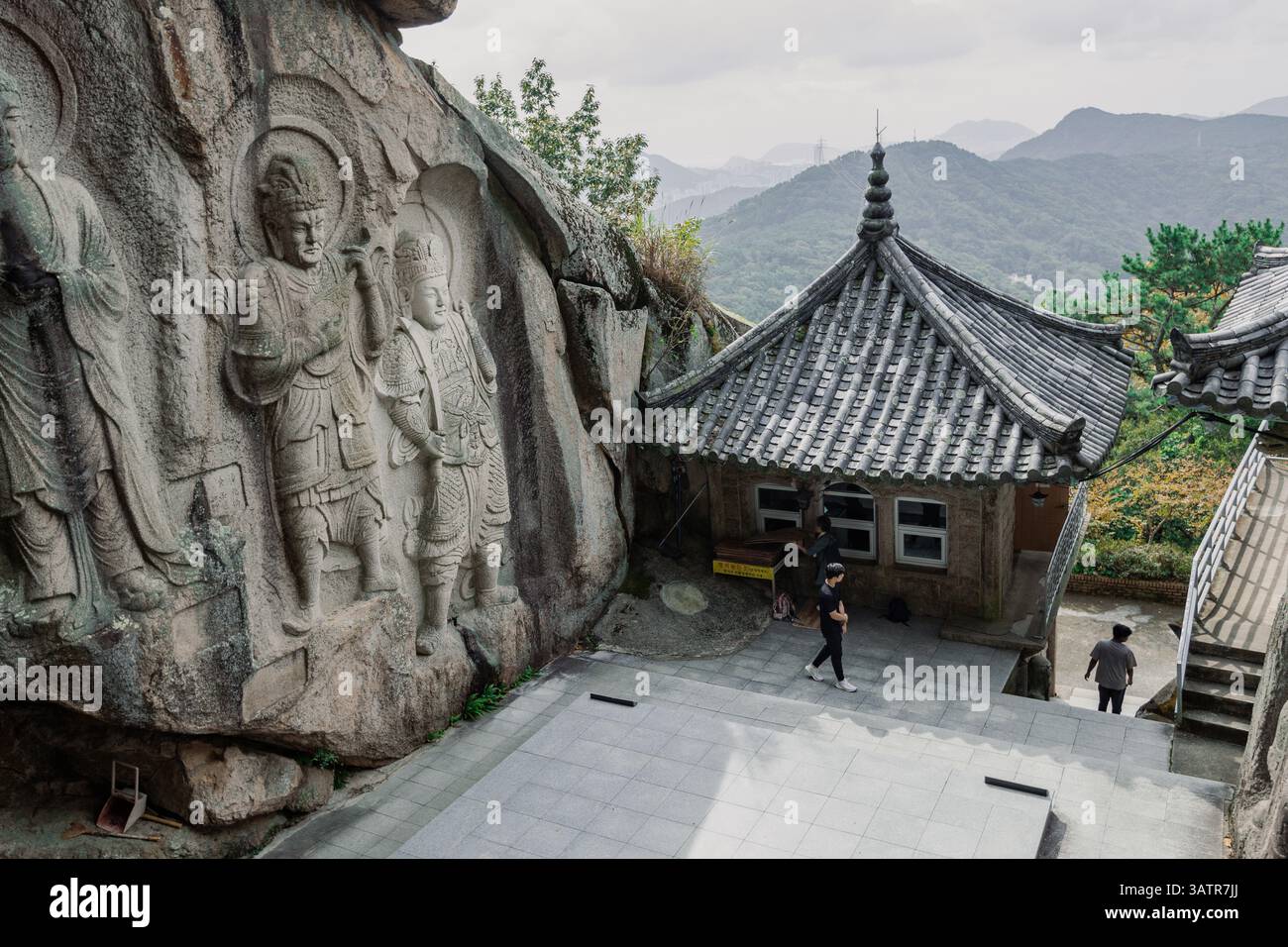 Impressive stone carvings in the natural cave at Seokbulsa Temple ...