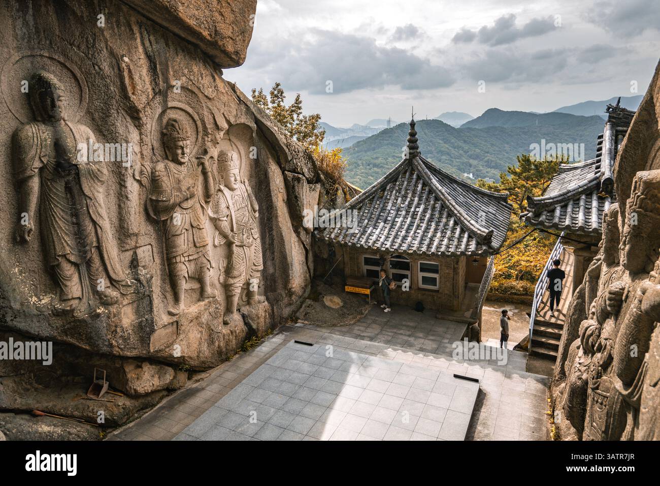 Impressive stone carvings in the natural cave at Seokbulsa Temple ...