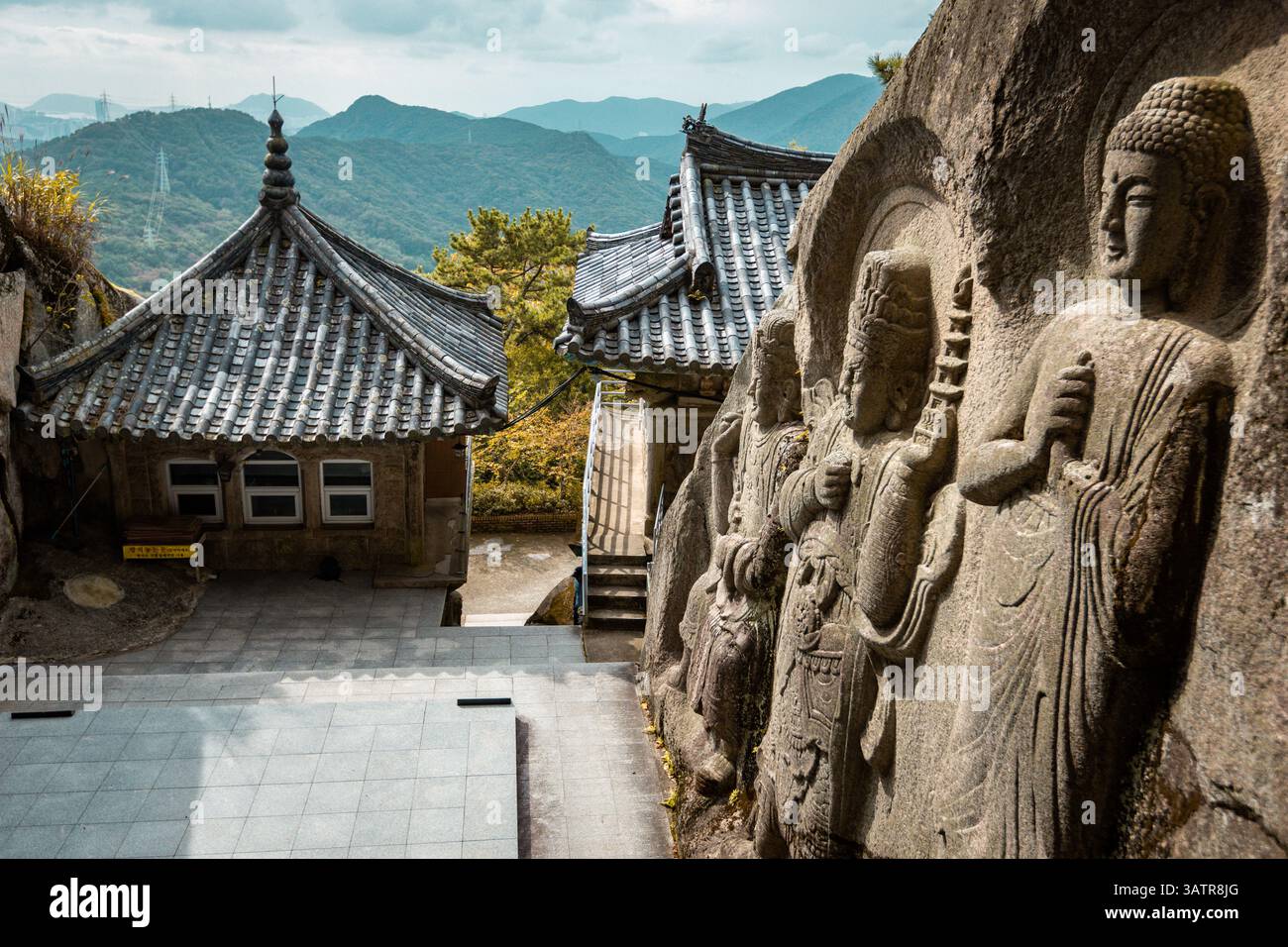 Impressive stone carvings in the natural cave at Seokbulsa Temple ...